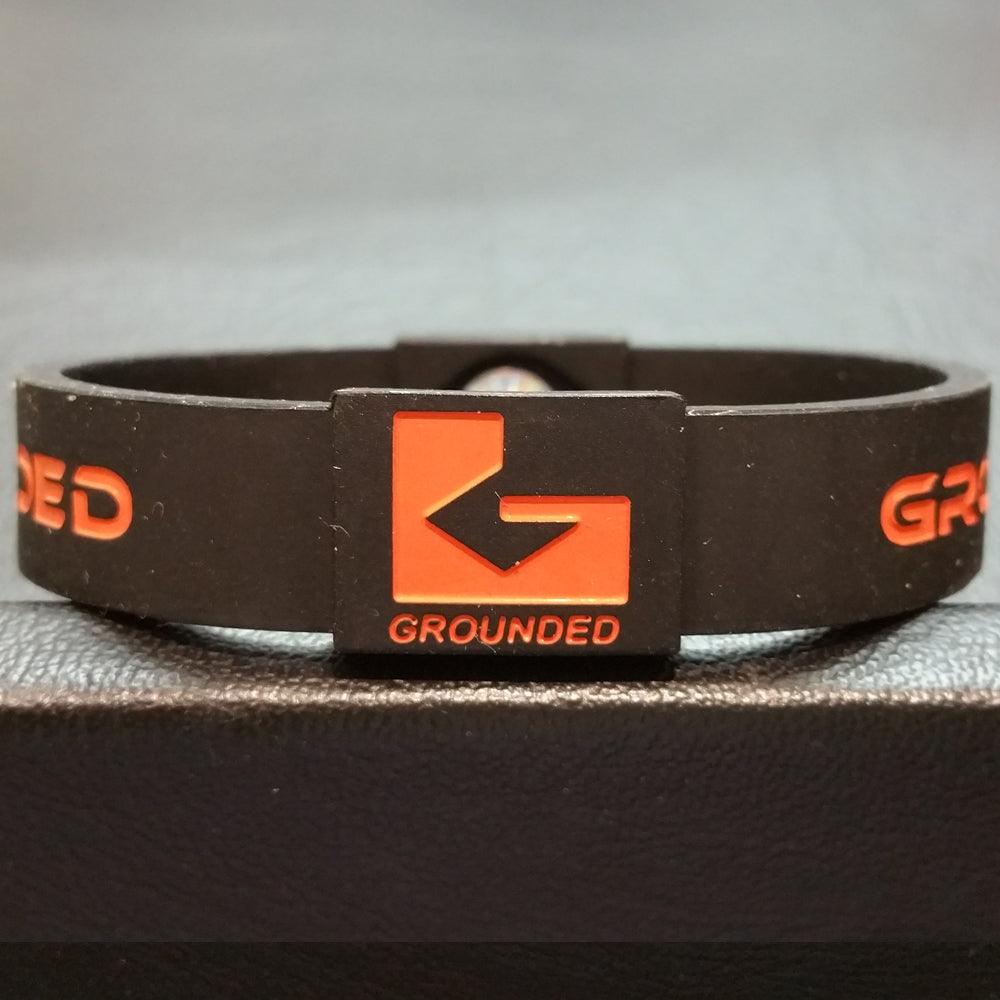 Grounded Energetic Wristband (Black/Orange) – Watch it! Pte Ltd